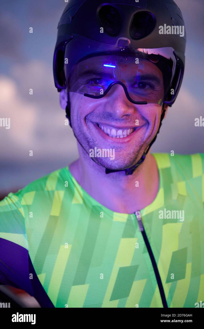 triathlon athlete portrait while resting on bike training Stock Photo ...