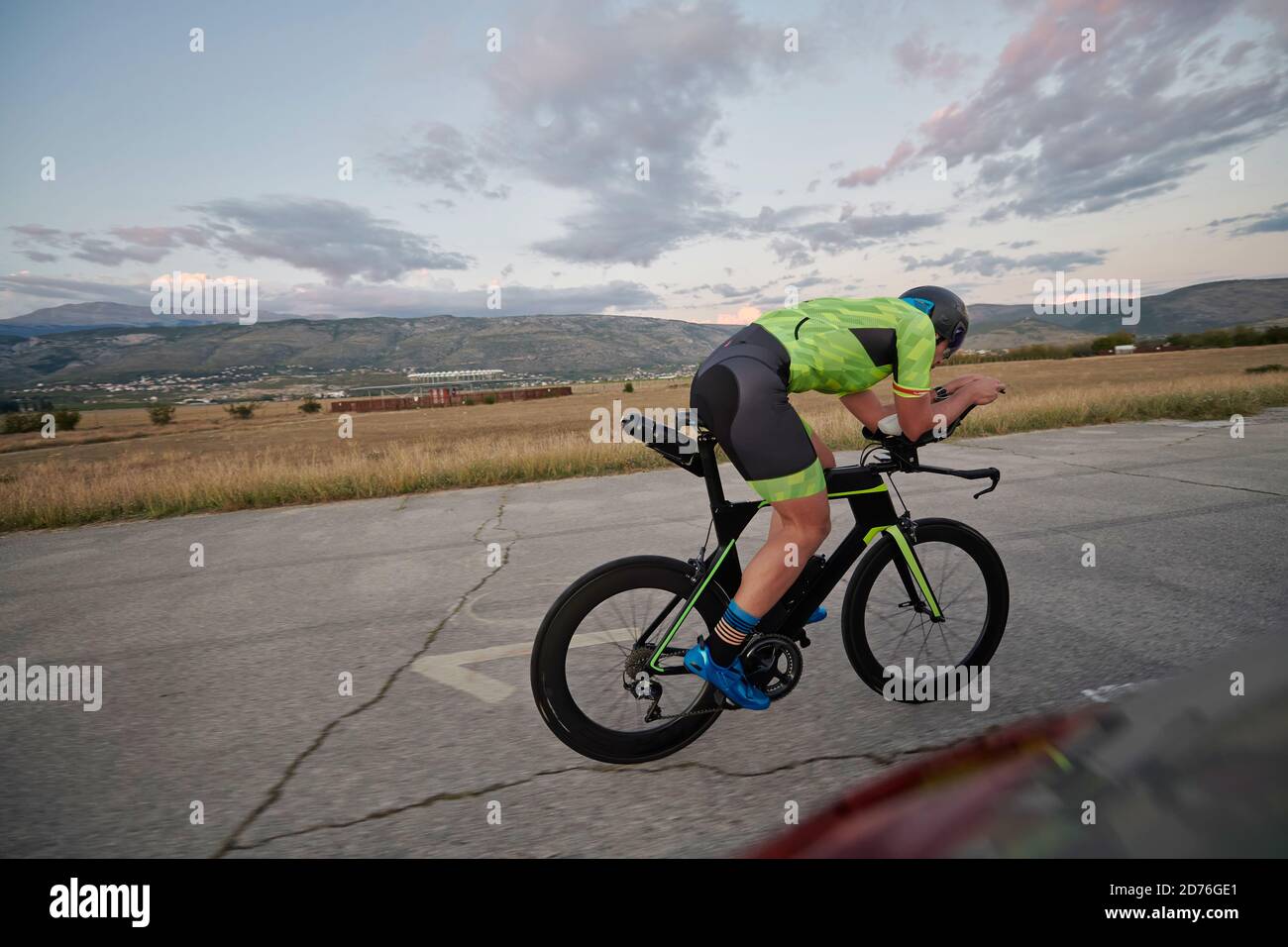 triathlon athlete riding a bike Stock Photo - Alamy