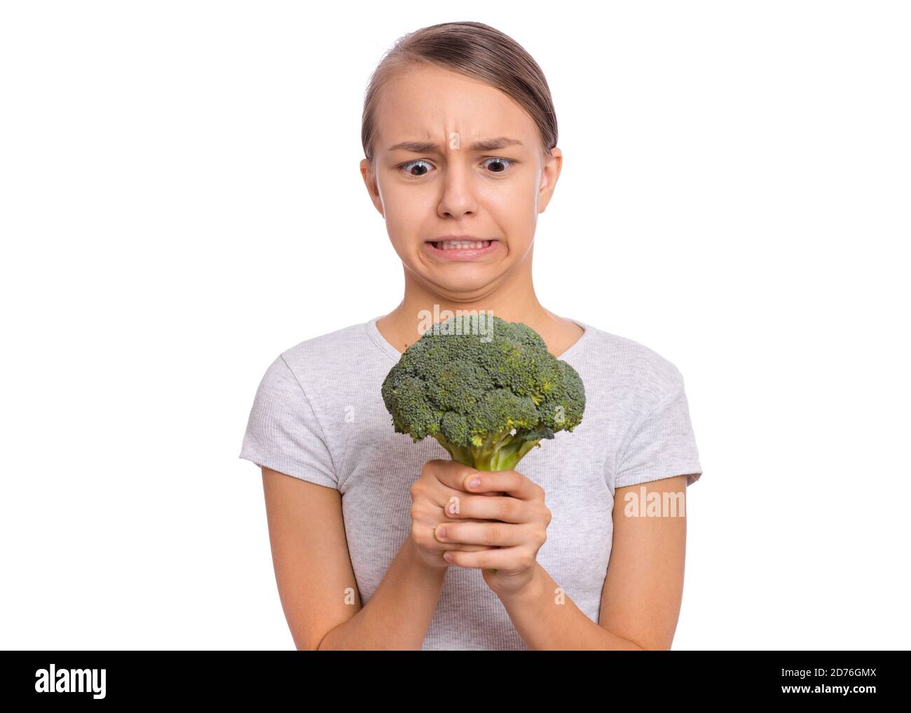 Happy beautiful young teen girl holding perfect product for dieting ...