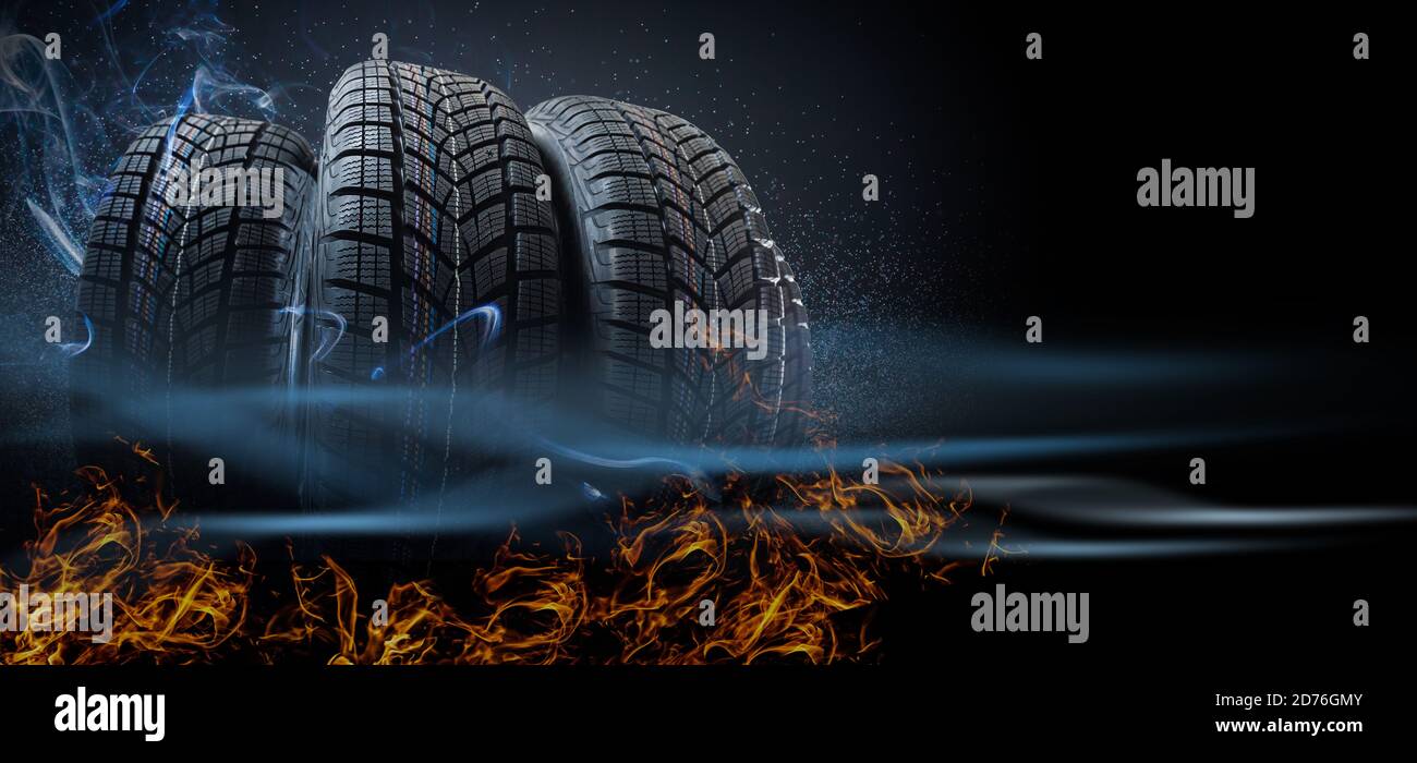 four black tires isolated on white background Stock Photo - Alamy