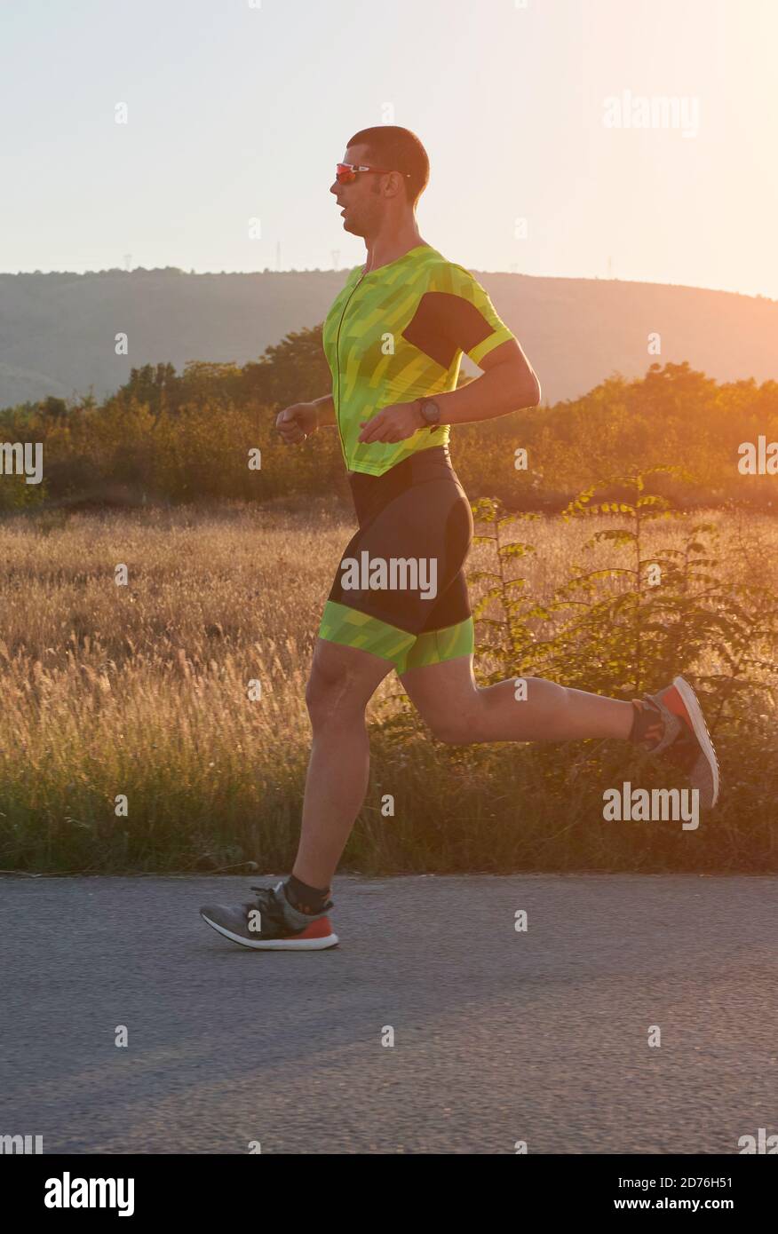 triathlon athlete running on morning trainig Stock Photo - Alamy