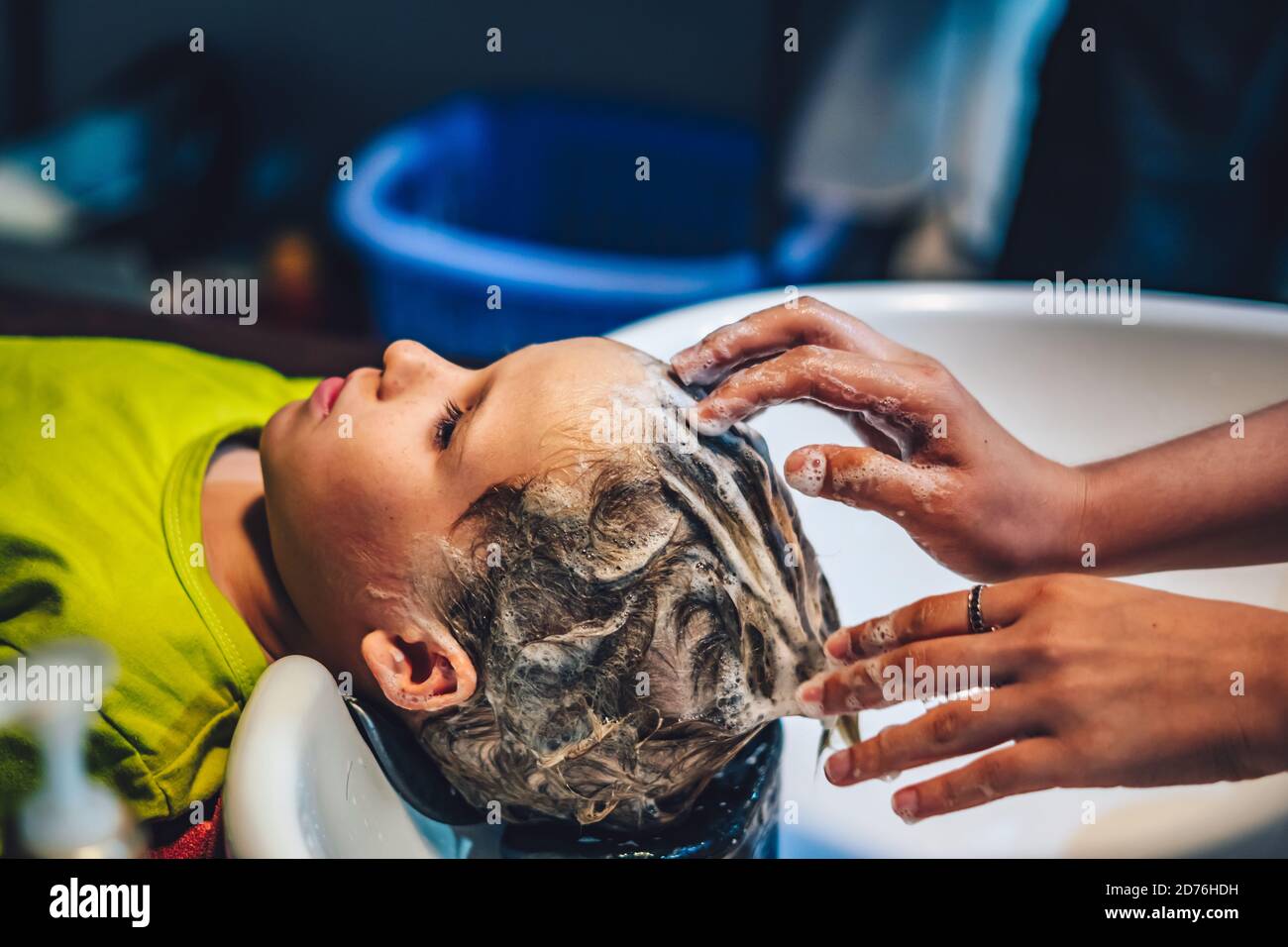 Wet Head White Blond little Boy lie leaning on over sink. Woman female ...