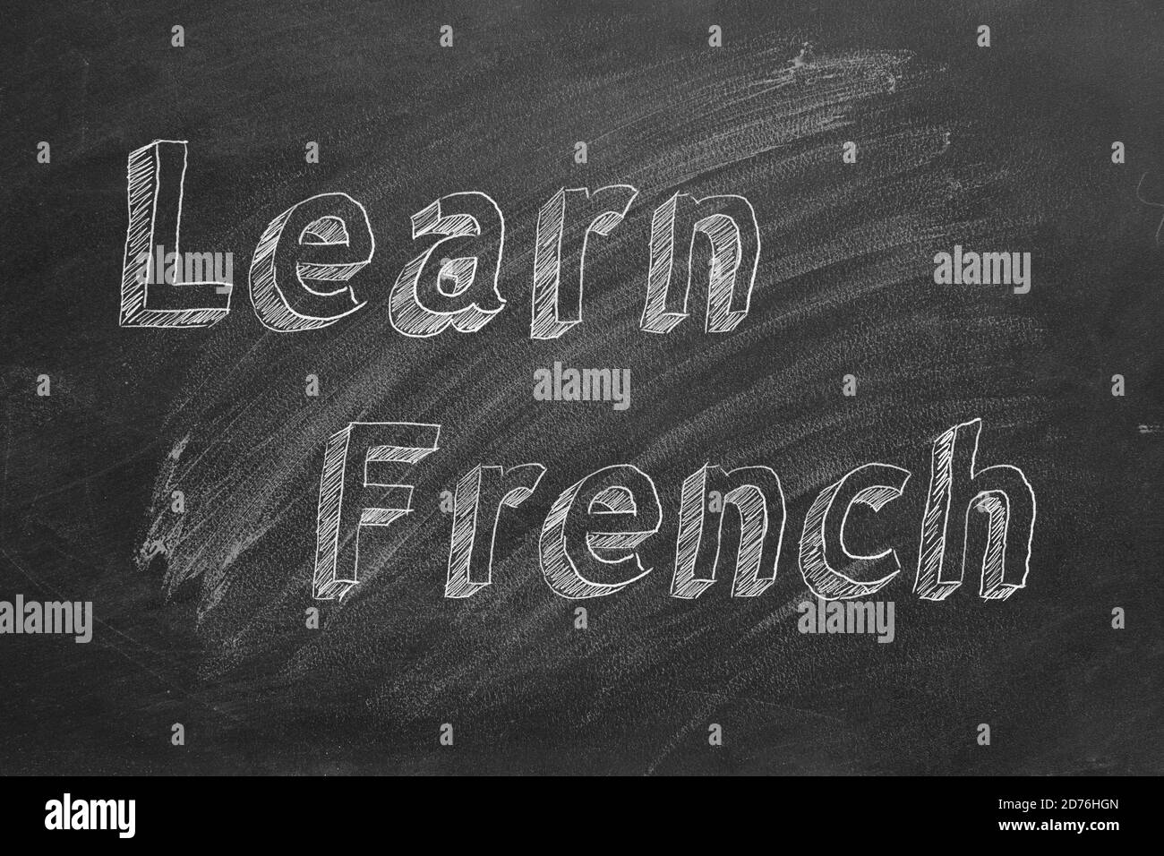 Hand drawing "Learn French" on blackboard Stock Photo - Alamy