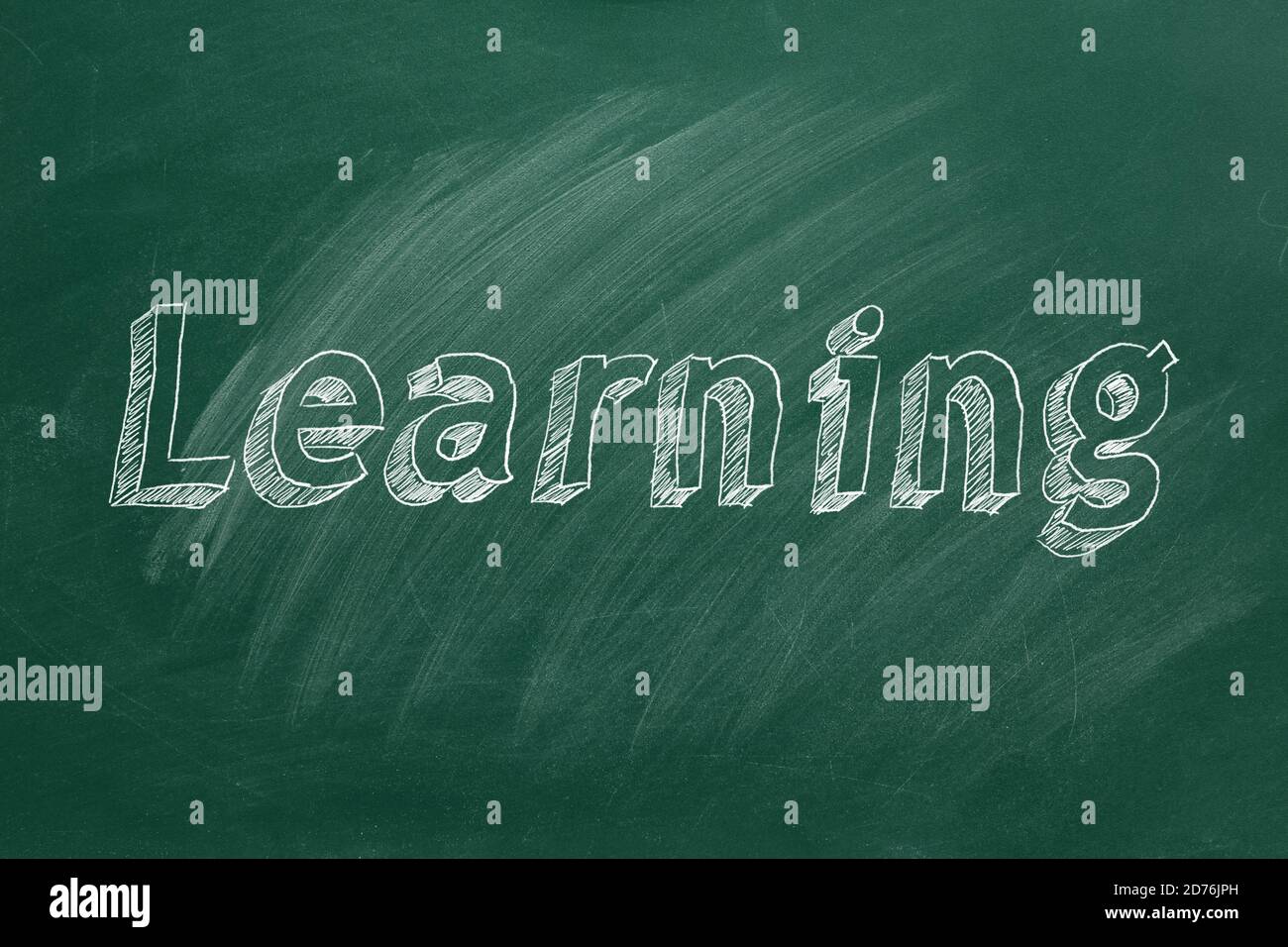 Hand drawing "Learning" on green chalkboard Stock Photo - Alamy