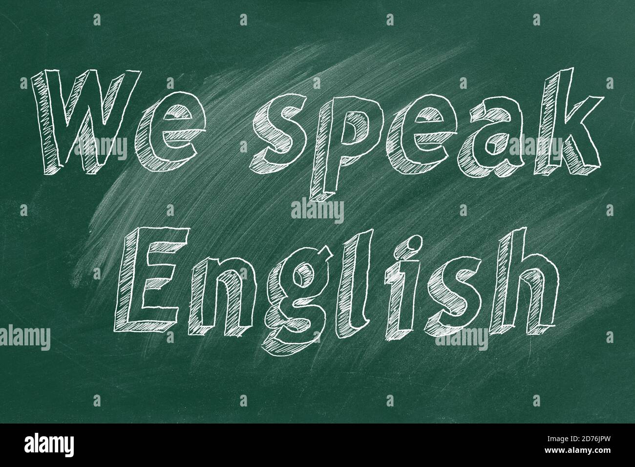 Hand drawing "We speak English" on green chalkboard Stock Photo - Alamy