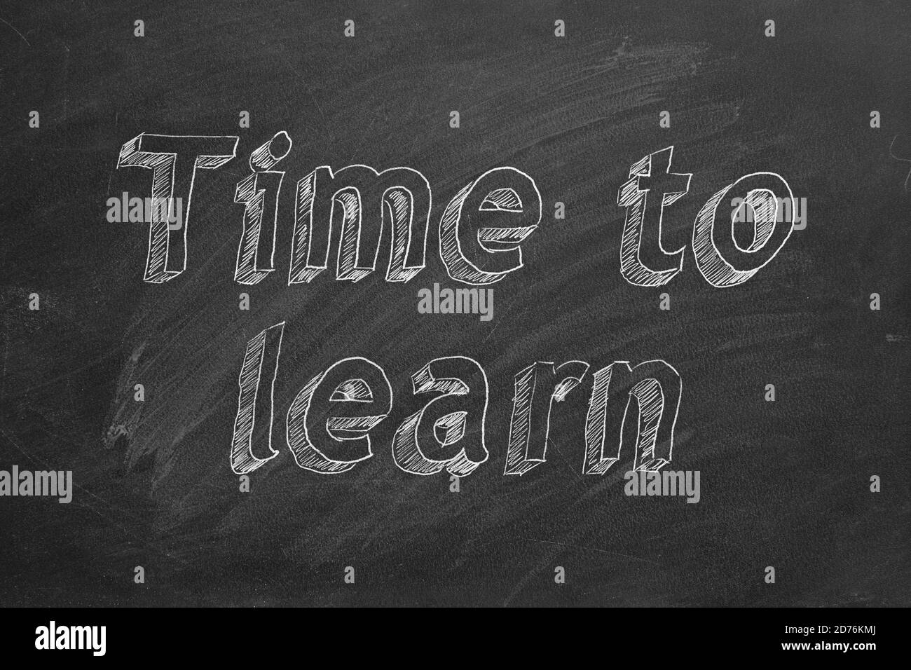 Hand drawing "Time to learn" on black chalkboard Stock Photo - Alamy