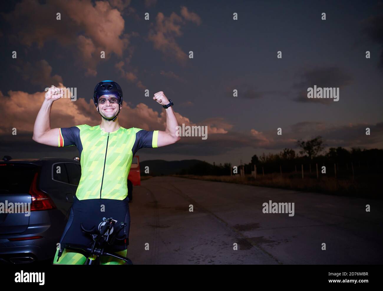 triathlon athlete portrait while resting on bike training Stock Photo ...