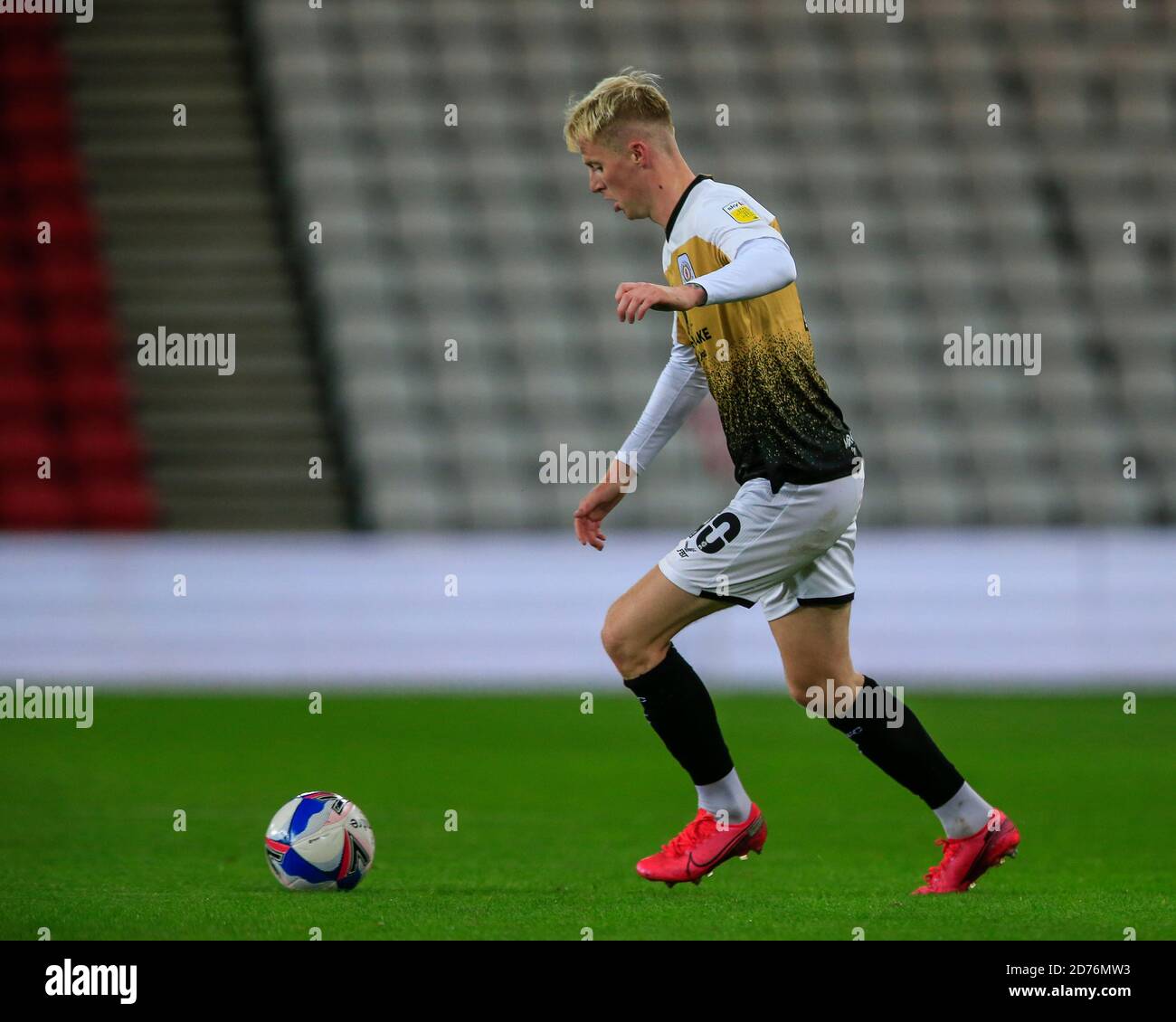 Charlie Kirk (10) of Crewe Alexandra in possession of the ball Stock ...