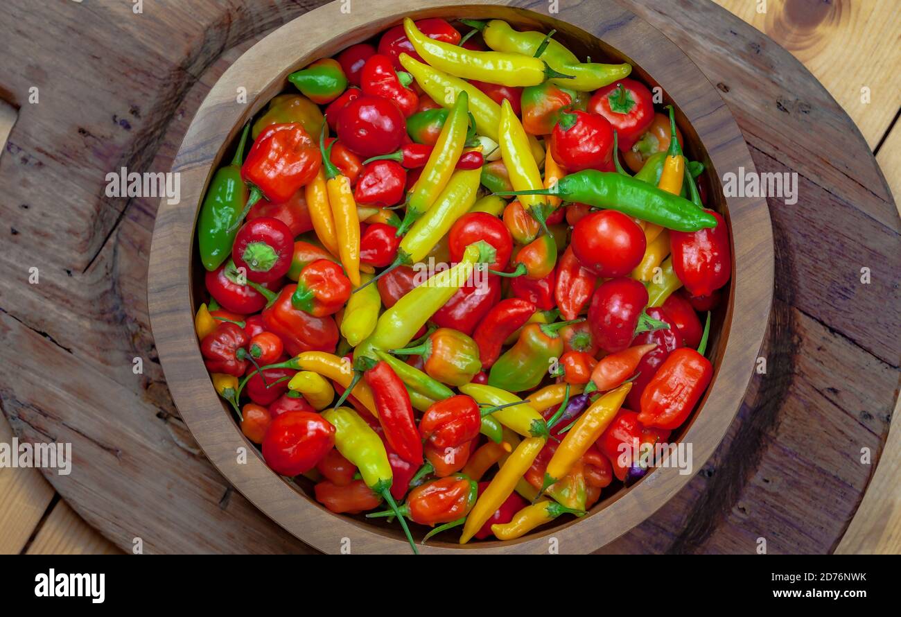 Assorted fresh and fiery hot chili peppers Stock Photo - Alamy