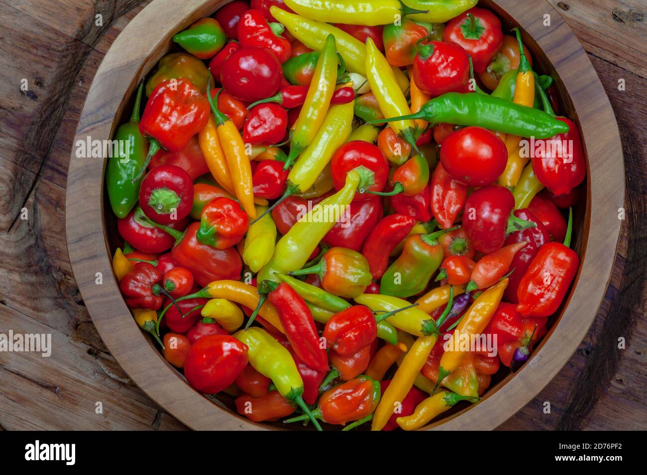 Assorted fresh and fiery hot chili peppers Stock Photo - Alamy