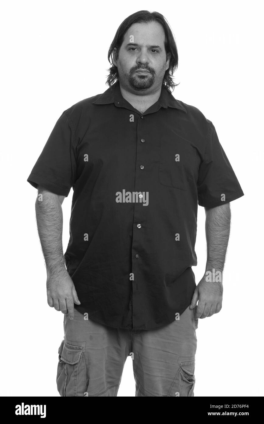 Portrait of overweight bearded man looking at camera Stock Photo - Alamy