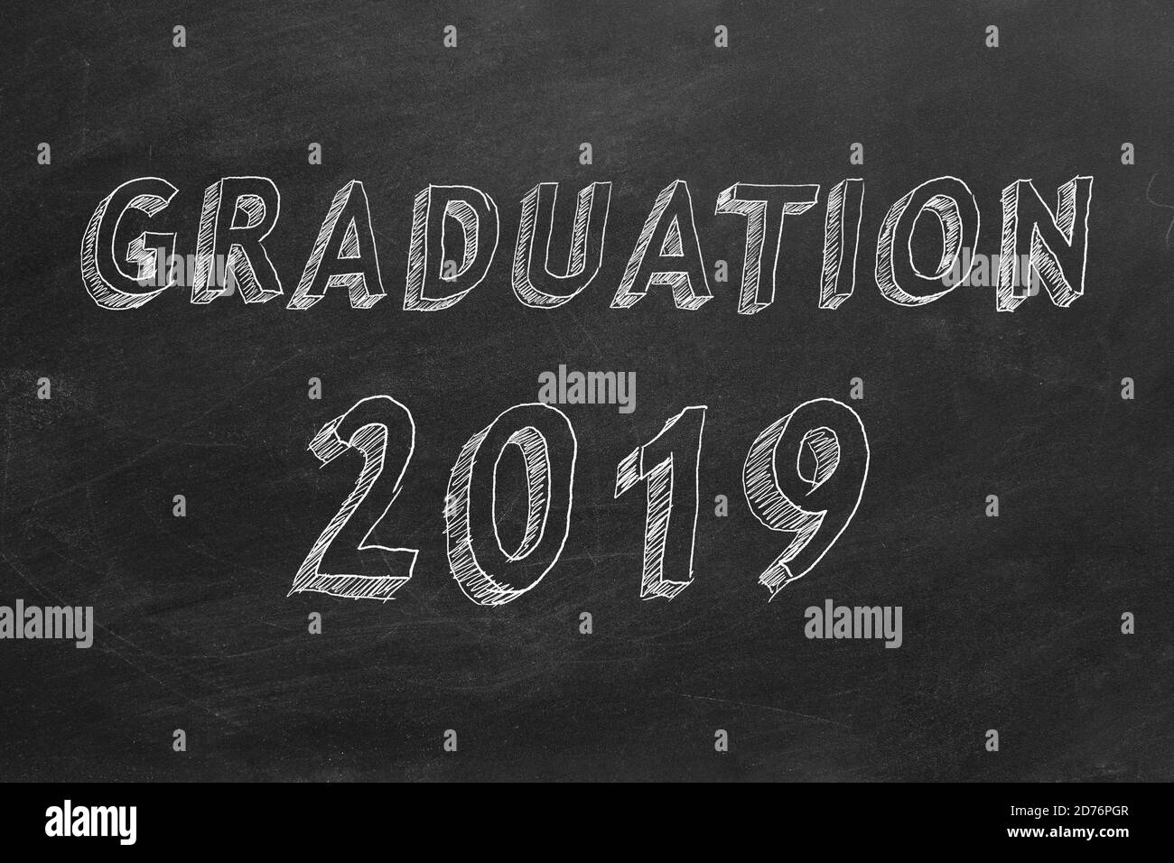 Hand drawing "Graduation 2019" on blackboard Stock Photo - Alamy
