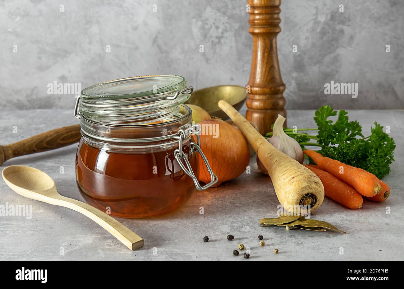 Homemade beef bone broth in a glass jar Stock Photo - Alamy