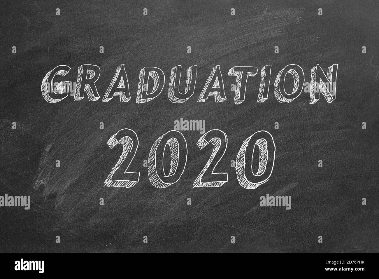 Hand drawing "Graduation 2020" on blackboard Stock Photo - Alamy