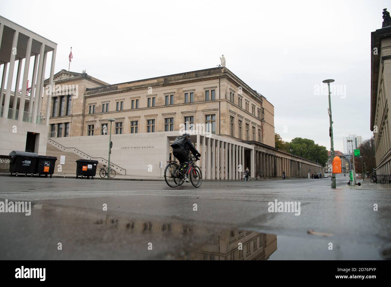 Berlin, Germany. 21st Oct, 2020. A cyclist rides on the Museum Island ...