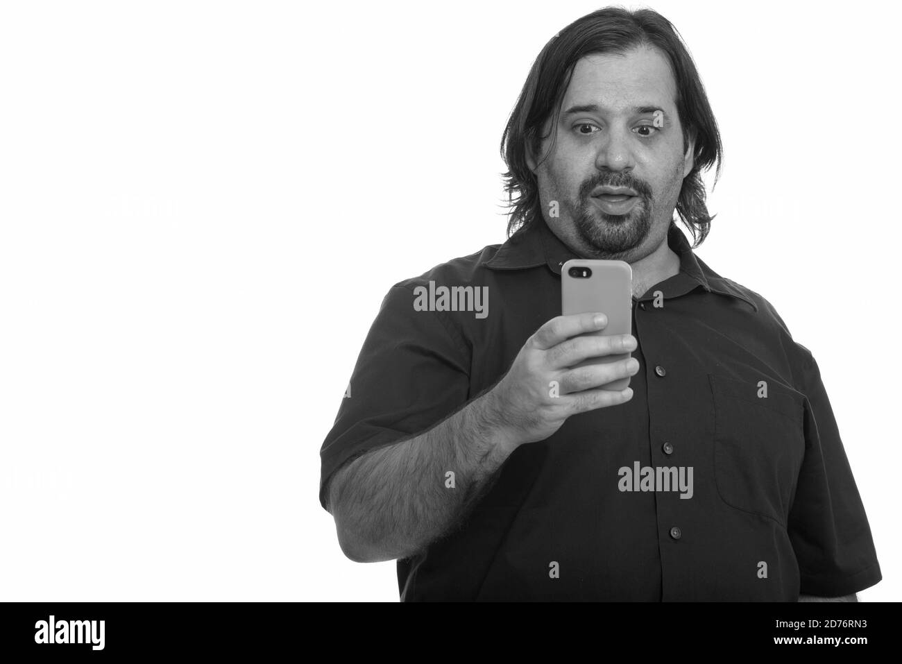 Fat man shocked phone Black and White Stock Photos & Images - Alamy