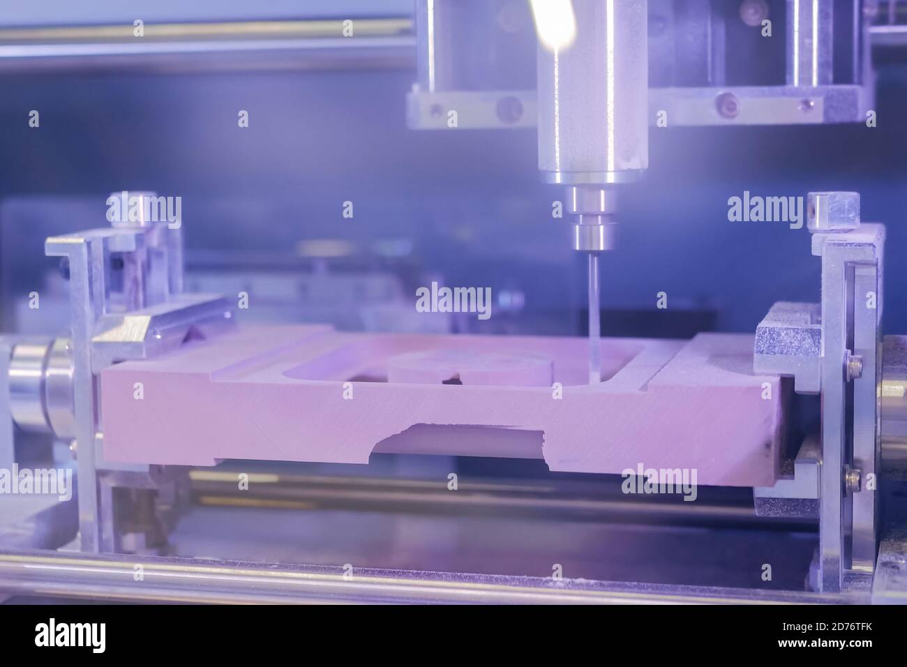 Automated milling machine cutting wooden workpiece from wood pulp ...