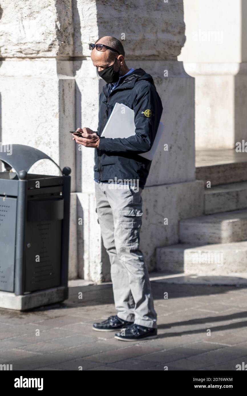 Young man talking phone italy hi-res stock photography and images - Alamy