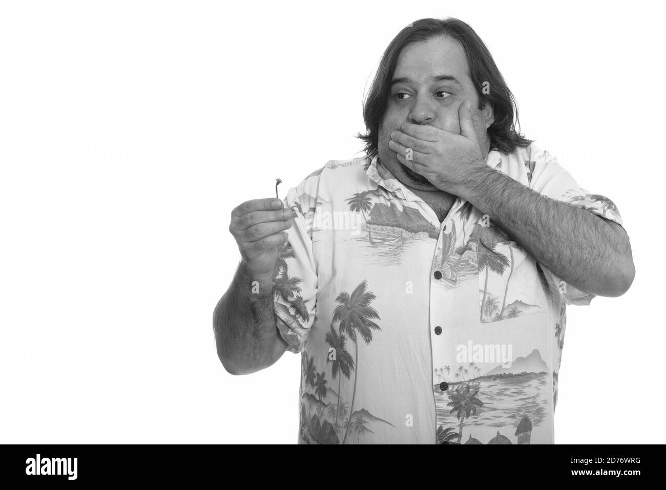 Man eating chili pepper Black and White Stock Photos & Images - Alamy