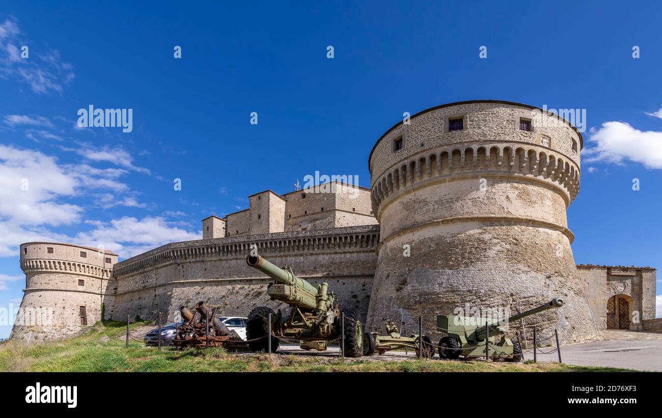 View of the ancient Rocca di San Leo fortress on a sunny day and blue ...