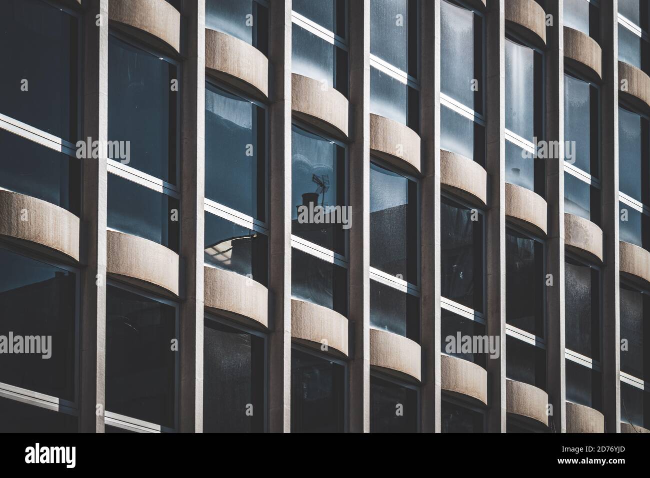 Rows of vertical windows on the facade of an office building Stock ...