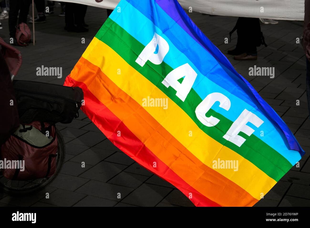 Rainbow flag with the Italian inscription Pace, translates as peace ...