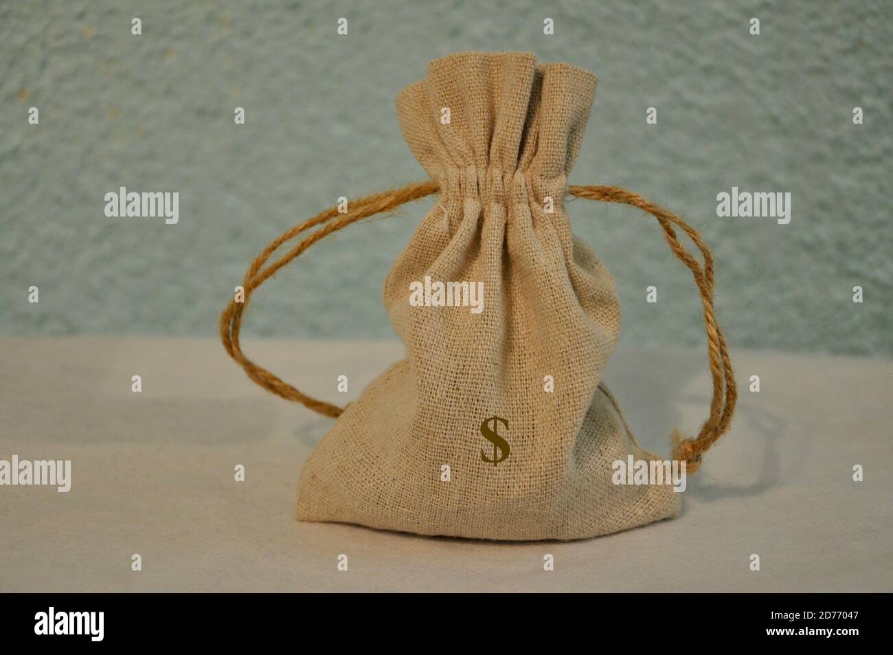 Piggy Bank, Money bag and coins on white table. Money saving. Bag full ...