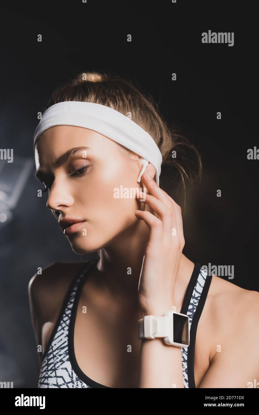 Portrait sportswoman smartwatch touching hi-res stock photography and ...