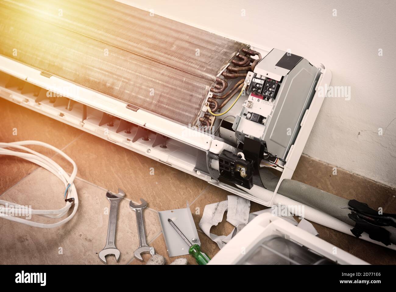 Air conditioning service, repair & maintenance concept. closeup at an ...