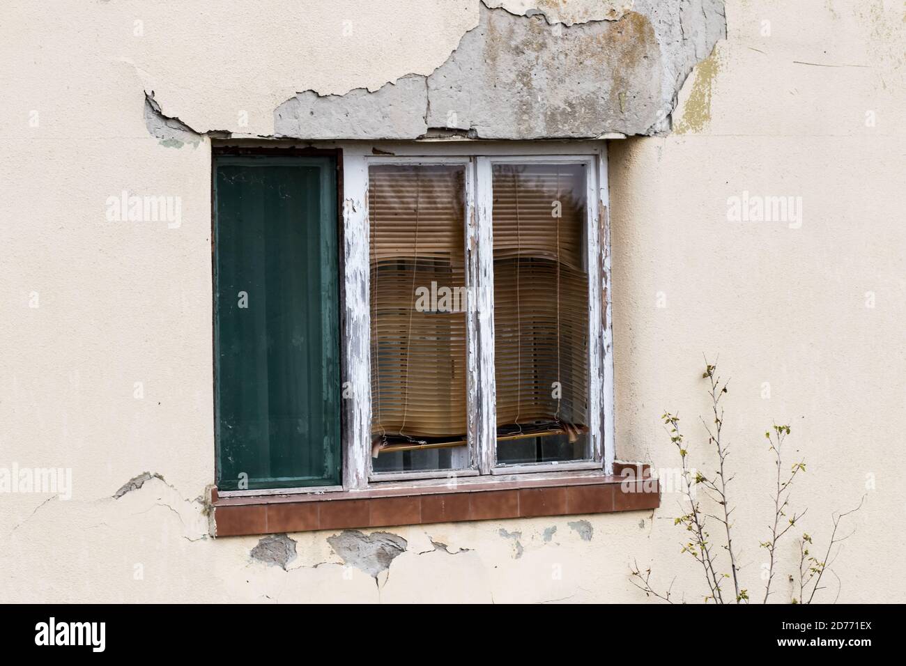A window on an old damaged house Stock Photo - Alamy