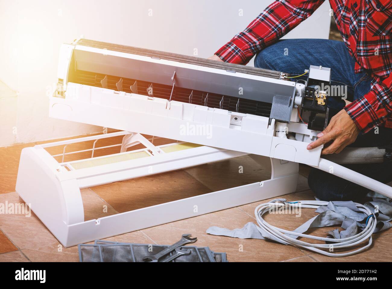 Air conditioning service, repair & maintenance concept. closeup at an ...