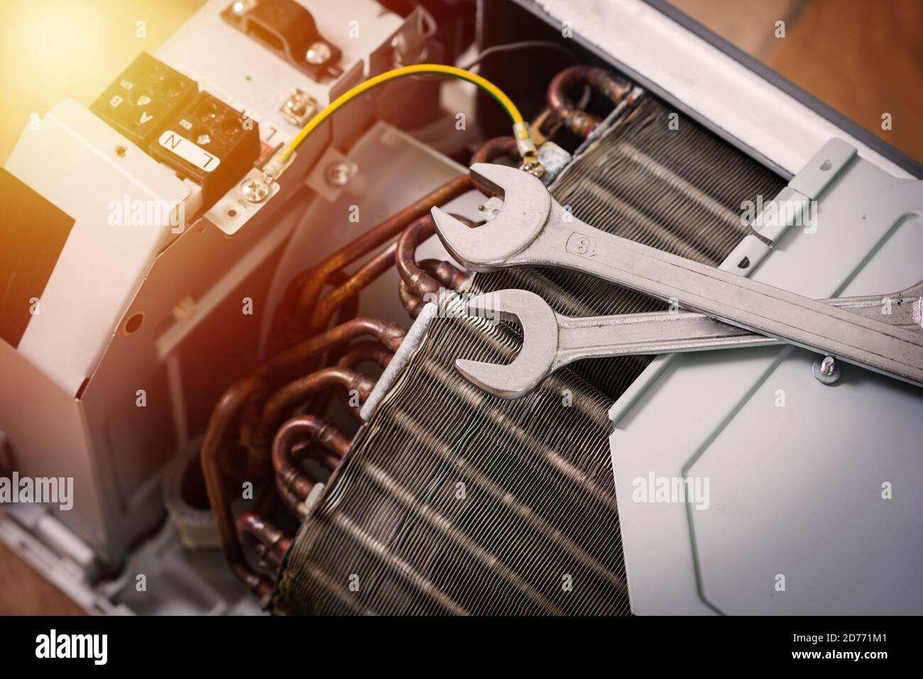 Air conditioning service, repair & maintenance concept. closeup at the ...