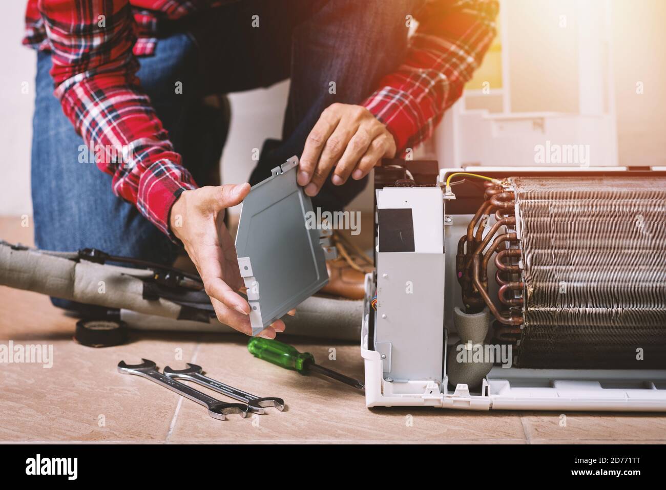 Air conditioning service, repair & maintenance concept. closeup at an ...