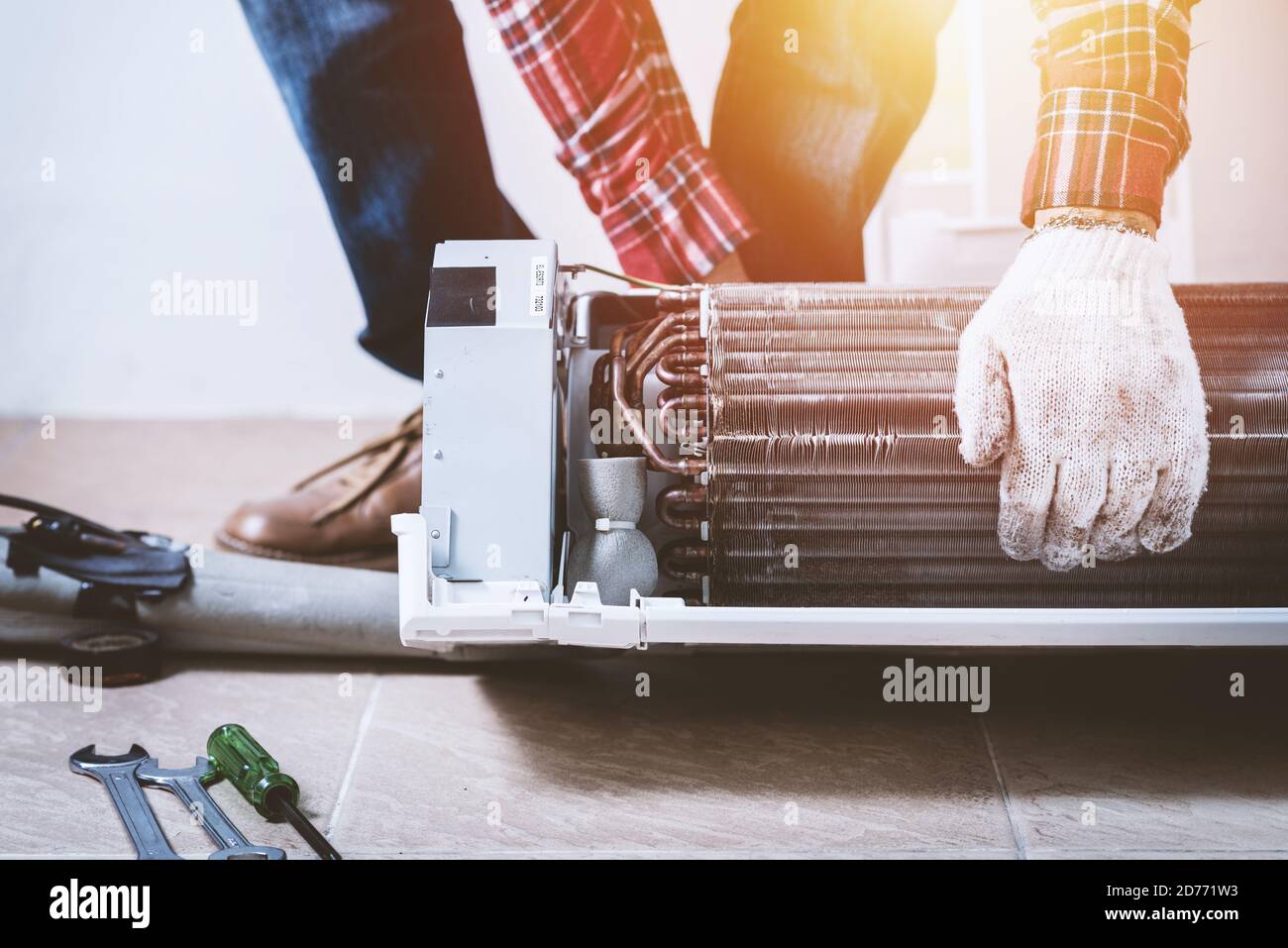 Air conditioning service, repair & maintenance concept. closeup at an ...