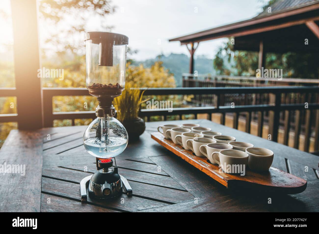 Vacuum retro coffee maker with beatiful view background Stock Photo - Alamy