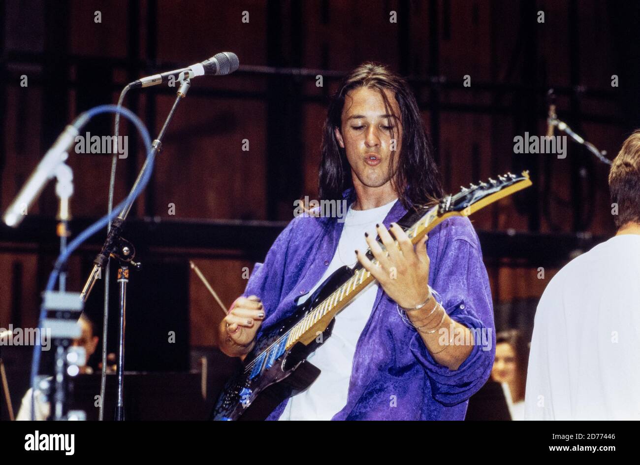 Soloist Jez Fielder playing guitar with the Bexhill College Rock ...