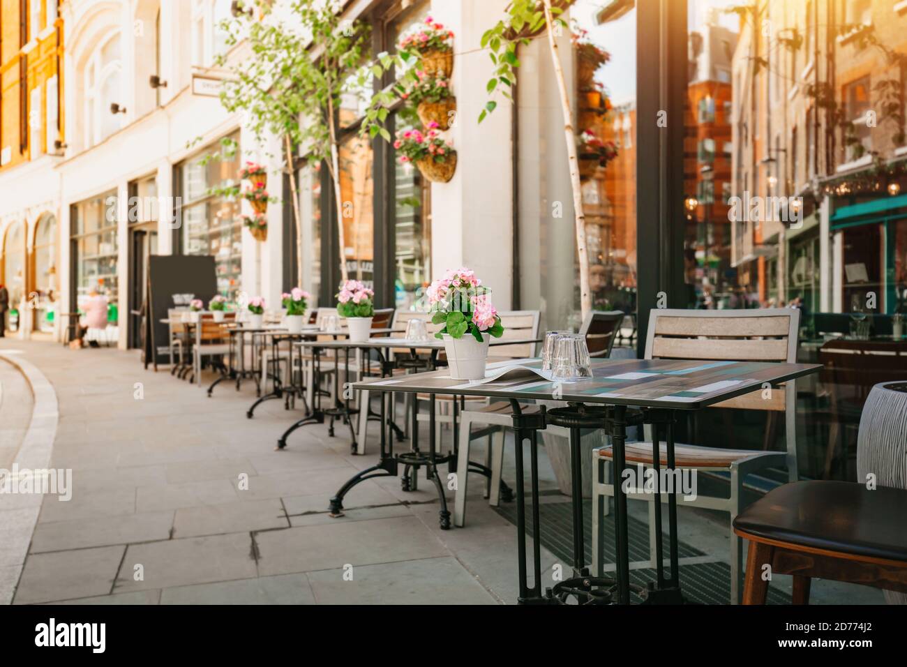 Empty coffee and restaurant terrace with tables and chairs in london ...