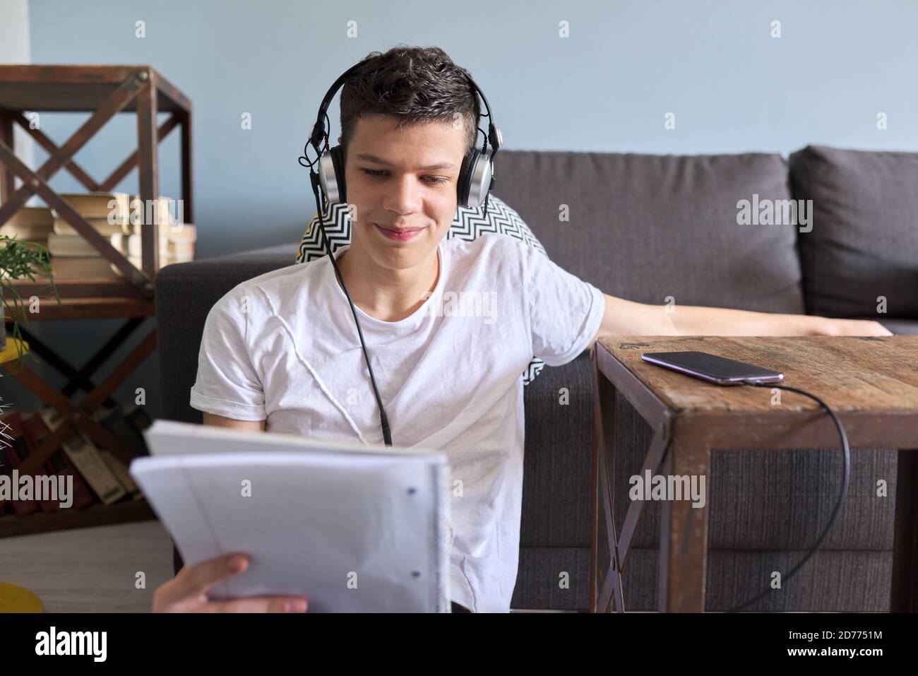 Teenager studying earphones hi-res stock photography and images - Alamy