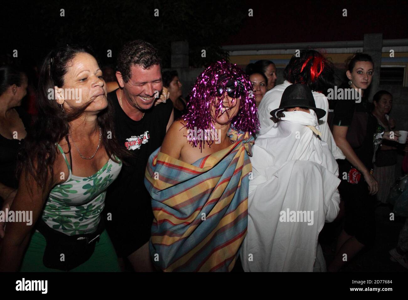 Carnival in Les Saintes Guadeloupe at night : young people laughing and ...