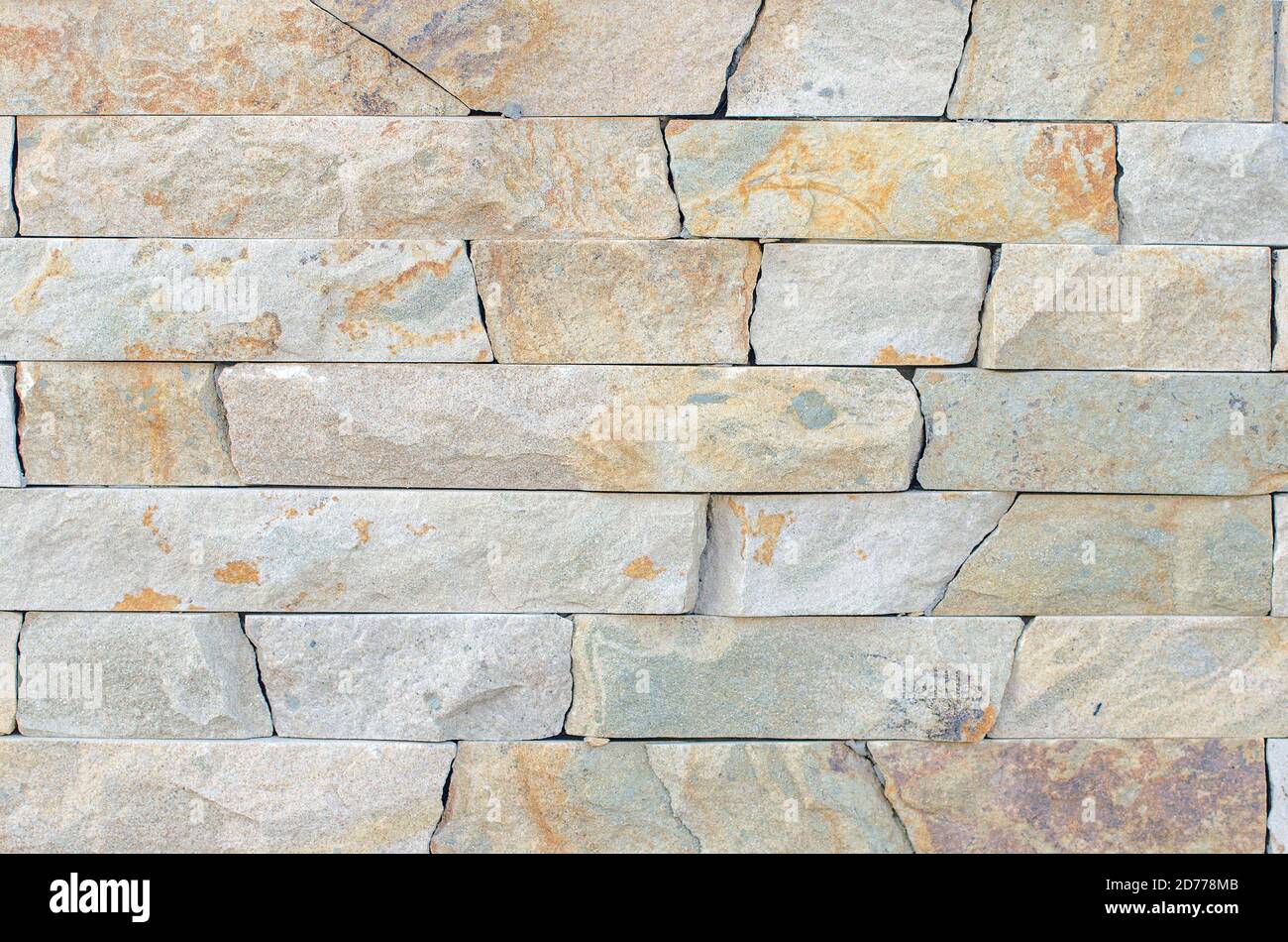 Stone wall texture background natural color Stock Photo - Alamy