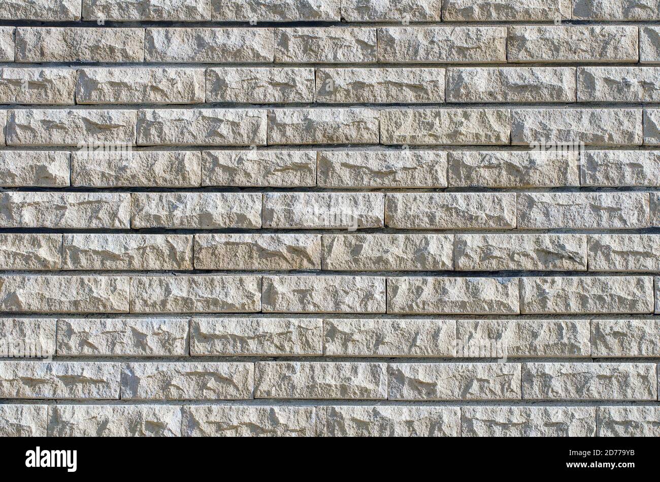 Stone wall texture background natural color Stock Photo - Alamy