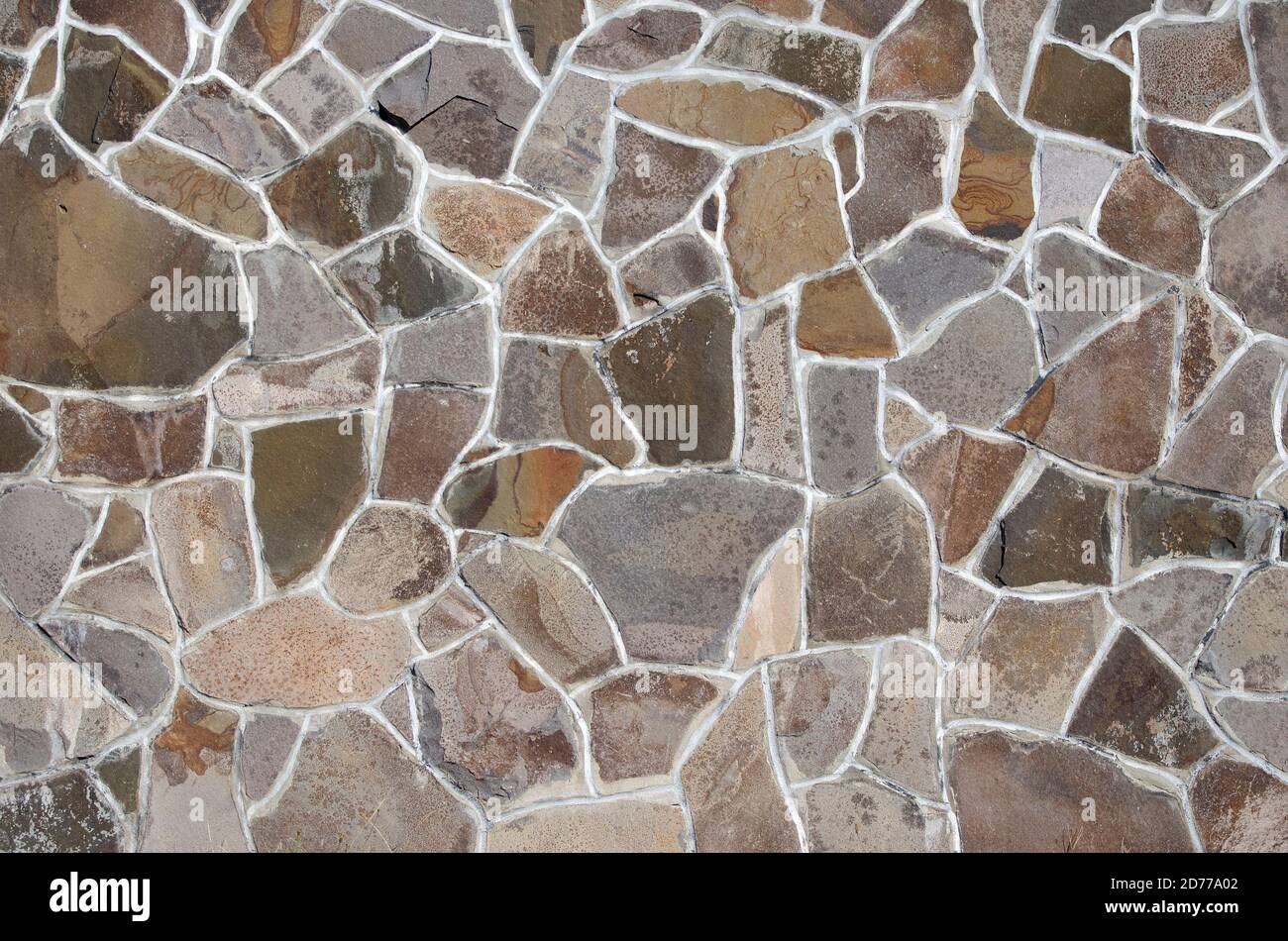 Stone wall texture background natural color Stock Photo - Alamy