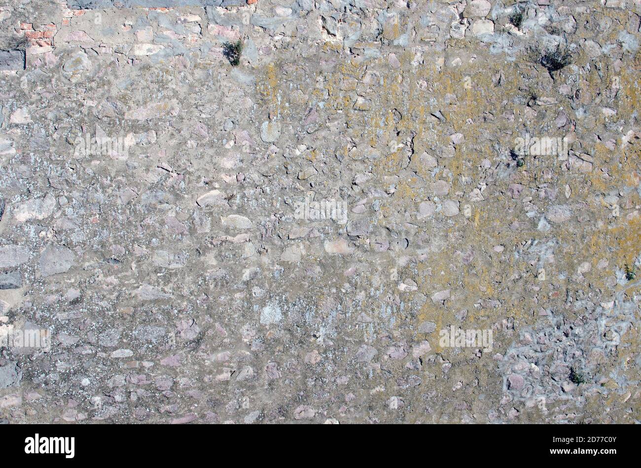 Stone wall texture background natural color Stock Photo - Alamy
