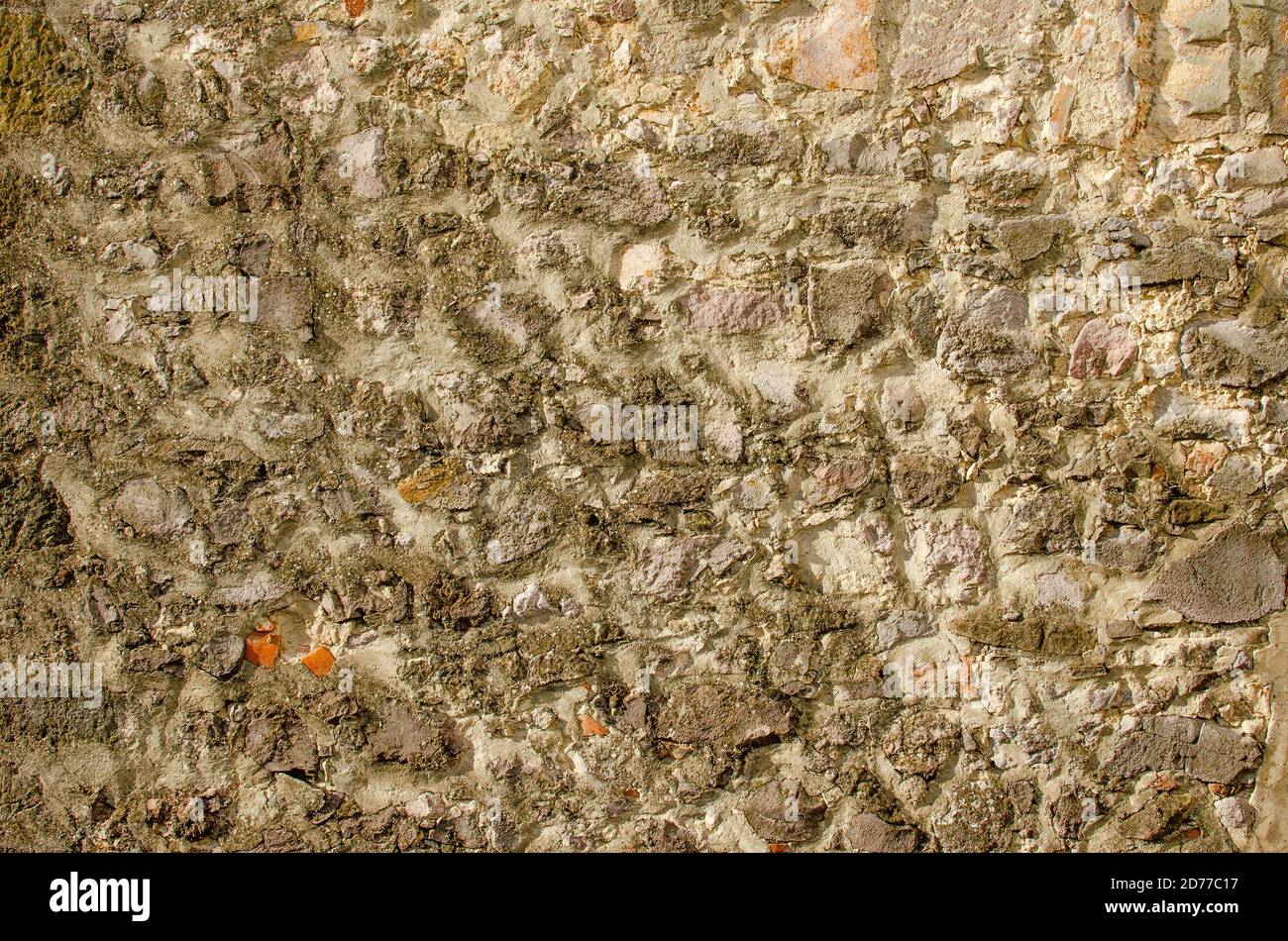 Stone wall texture background natural color Stock Photo - Alamy