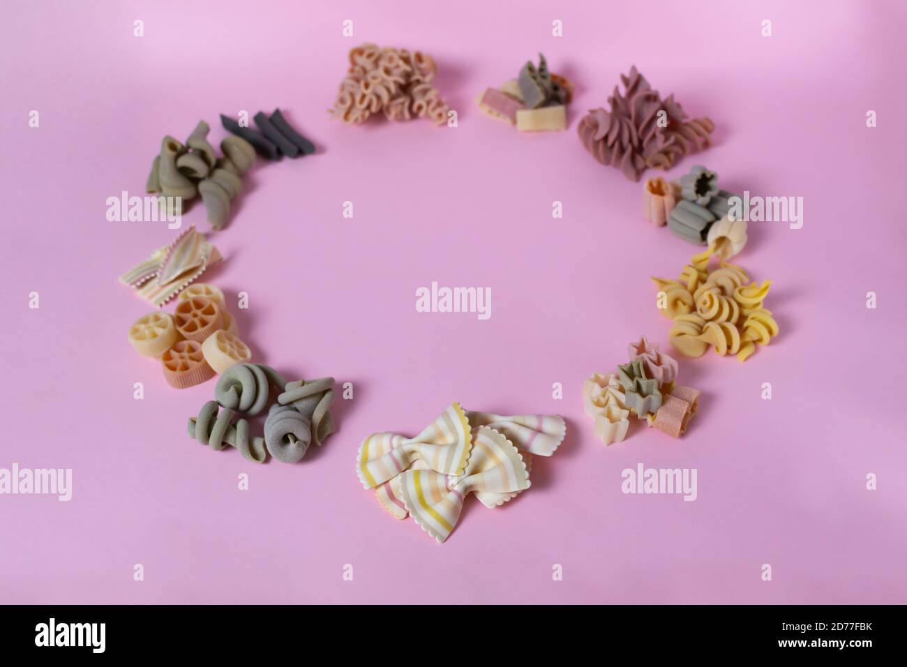 Italian pasta of different shapes and colors in the shape of a circle ...