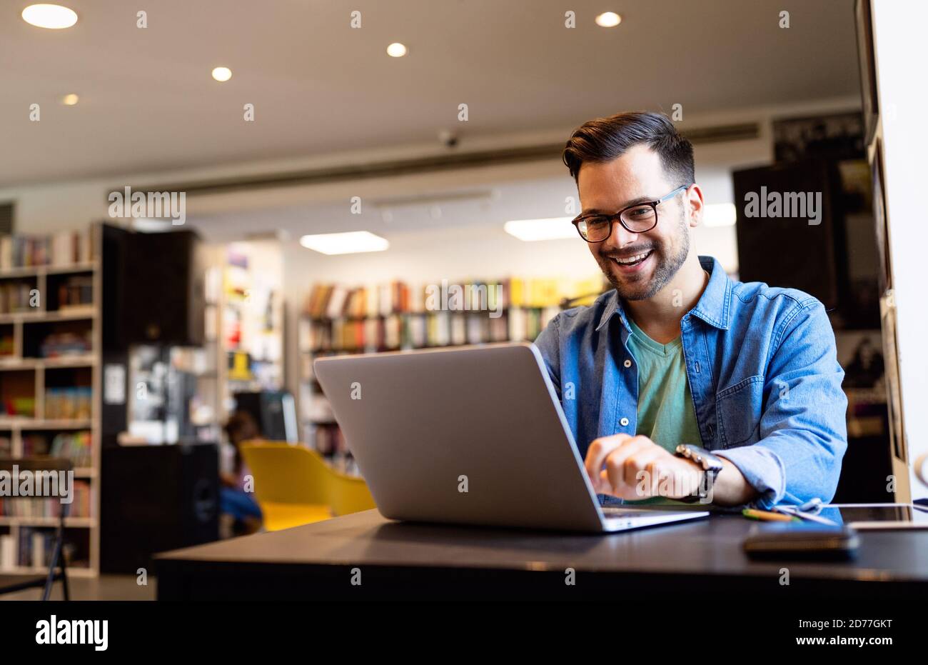 Happy man working on laptop. Technology people work study concept Stock ...