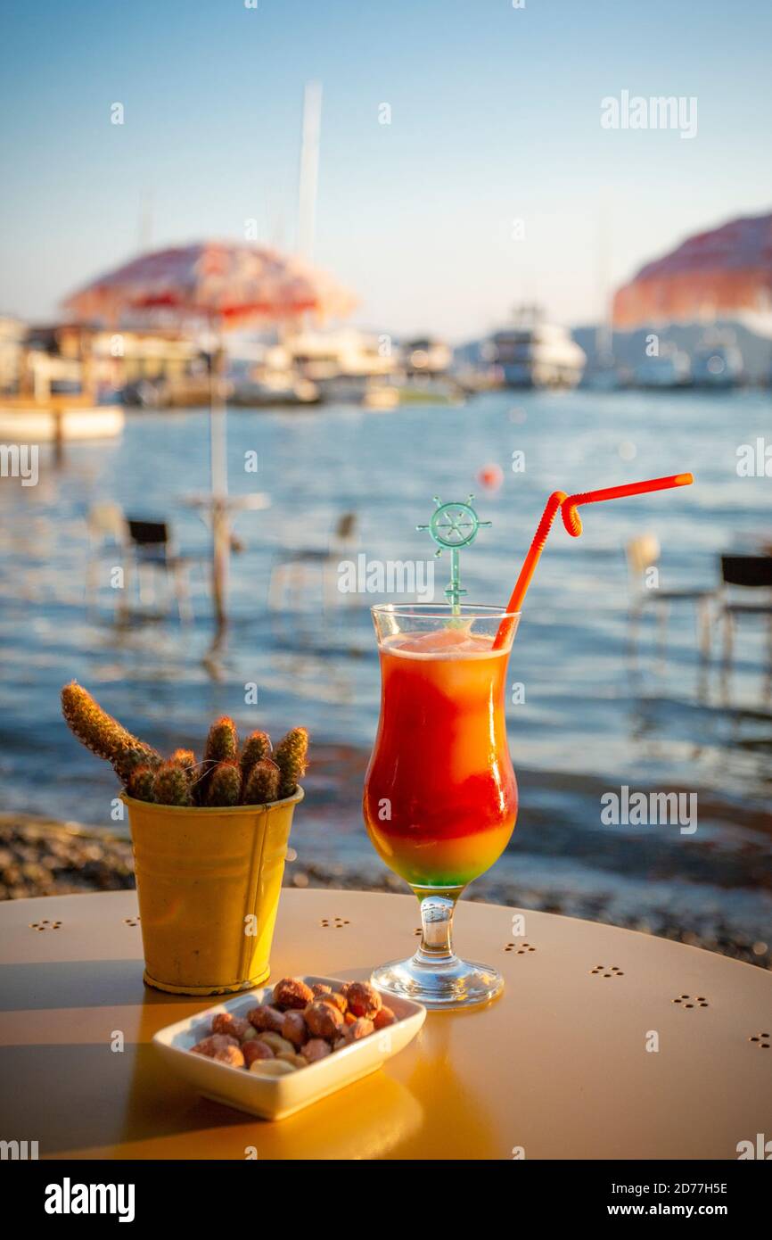 Cocktail and snacks on a table at a waterfront restaurant in Göcek ...