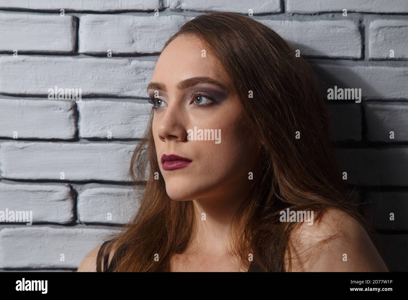 Studio with brick wall hi-res stock photography and images - Alamy