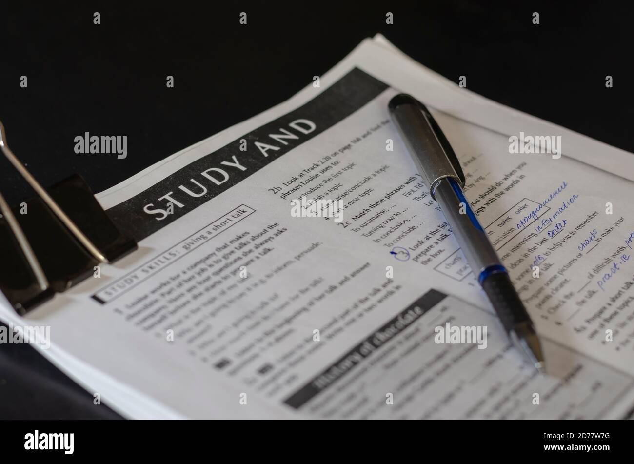 Exam tickets and a pen on the table. Partially completed multiple ...