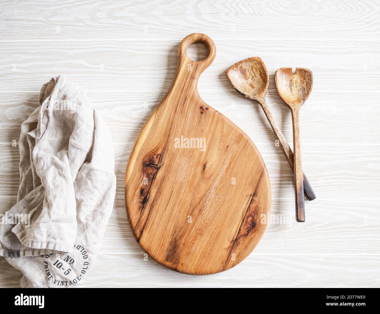 Kitchen cooking flat lay. Wood spoons and wood cutting board for ...